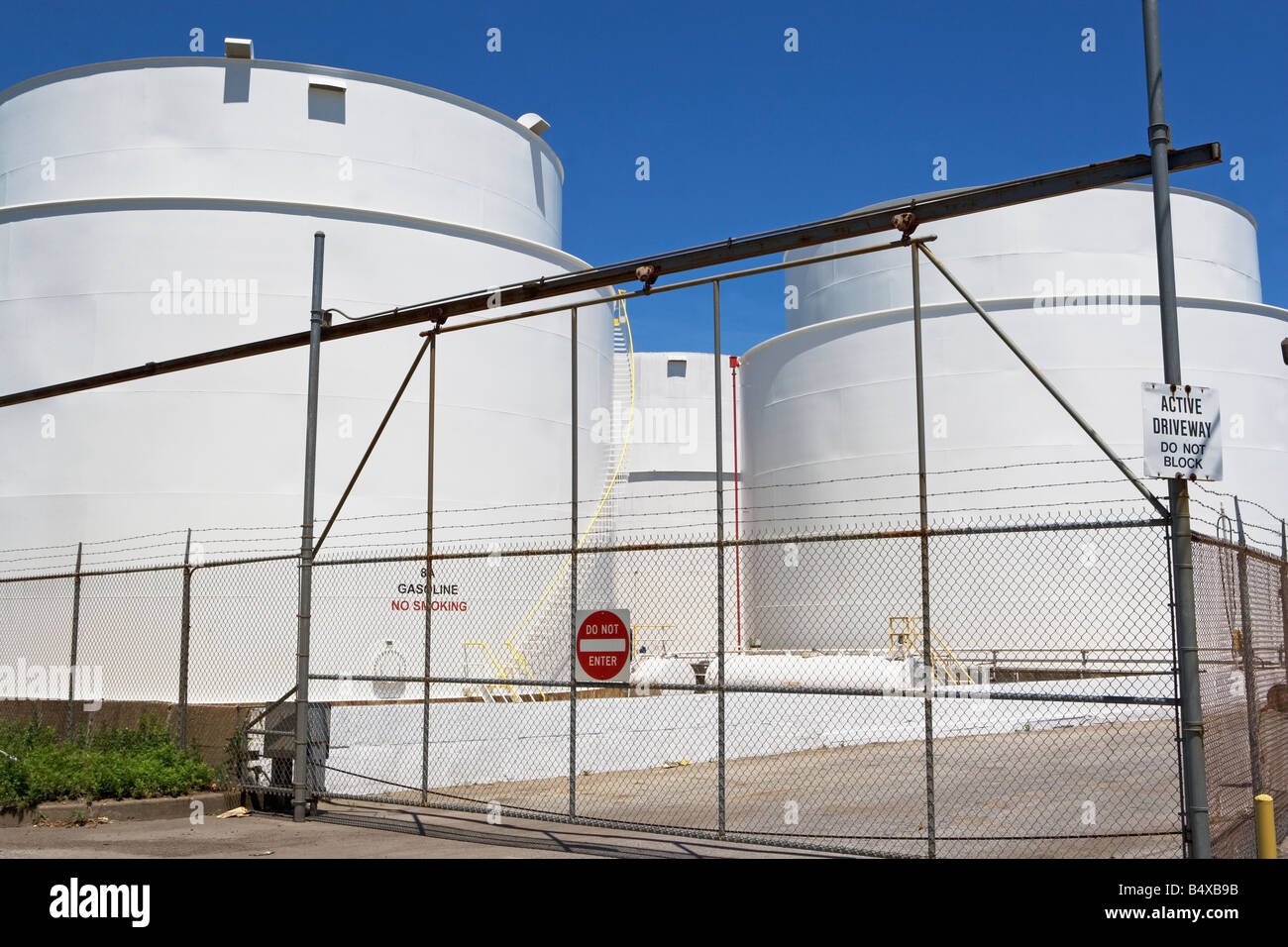 Secure oil storage tanks Stock Photo - Alamy