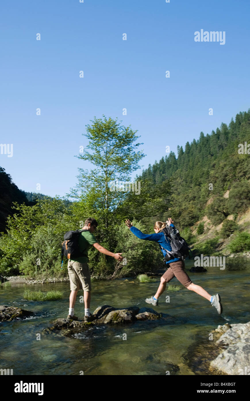 Two hikers walking across hi-res stock photography and images - Alamy