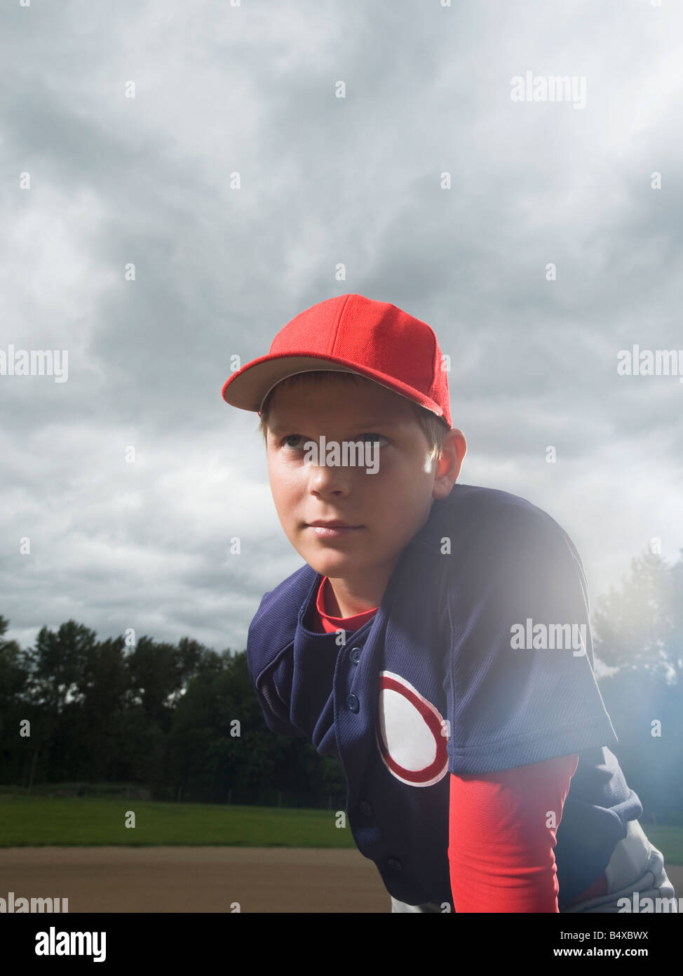 Baseball pitcher getting ready to throw ball Stock Photo - Alamy