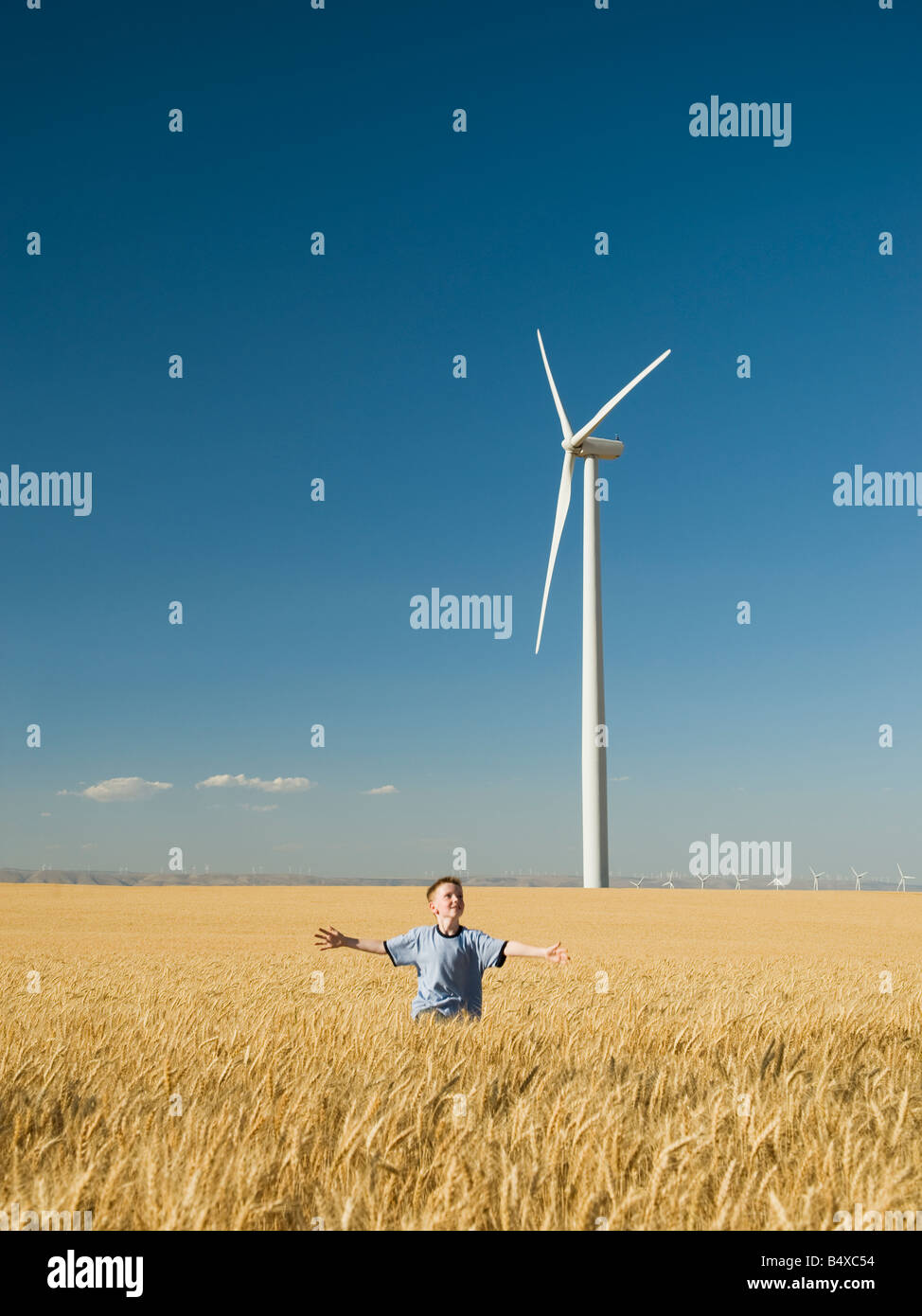 Boy running through field hi-res stock photography and images - Alamy