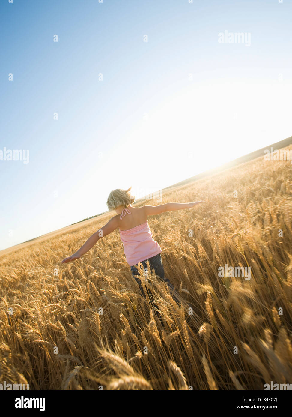 Running through field wheat hi-res stock photography and images - Alamy