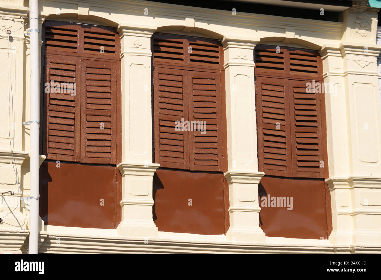 window of old colonial shophouse building in Penang, Malaysia Stock ...
