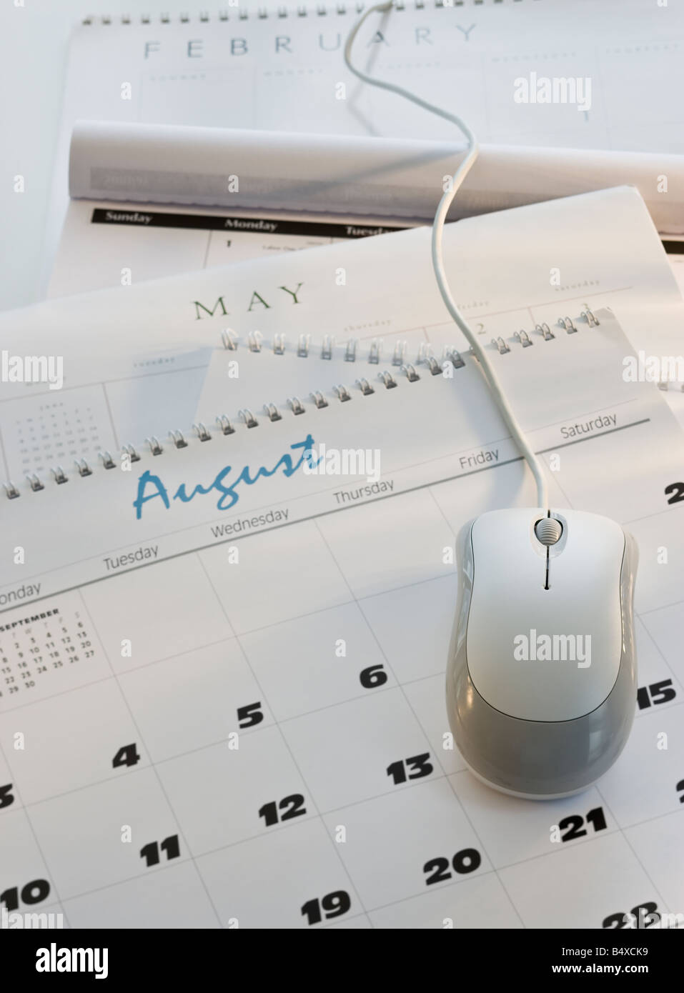 Close up of computer mouse on calendar Stock Photo - Alamy