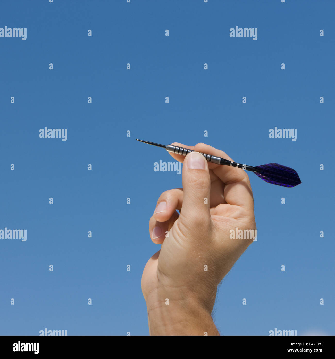 Man hand throwing dart hi-res stock photography and images - Alamy