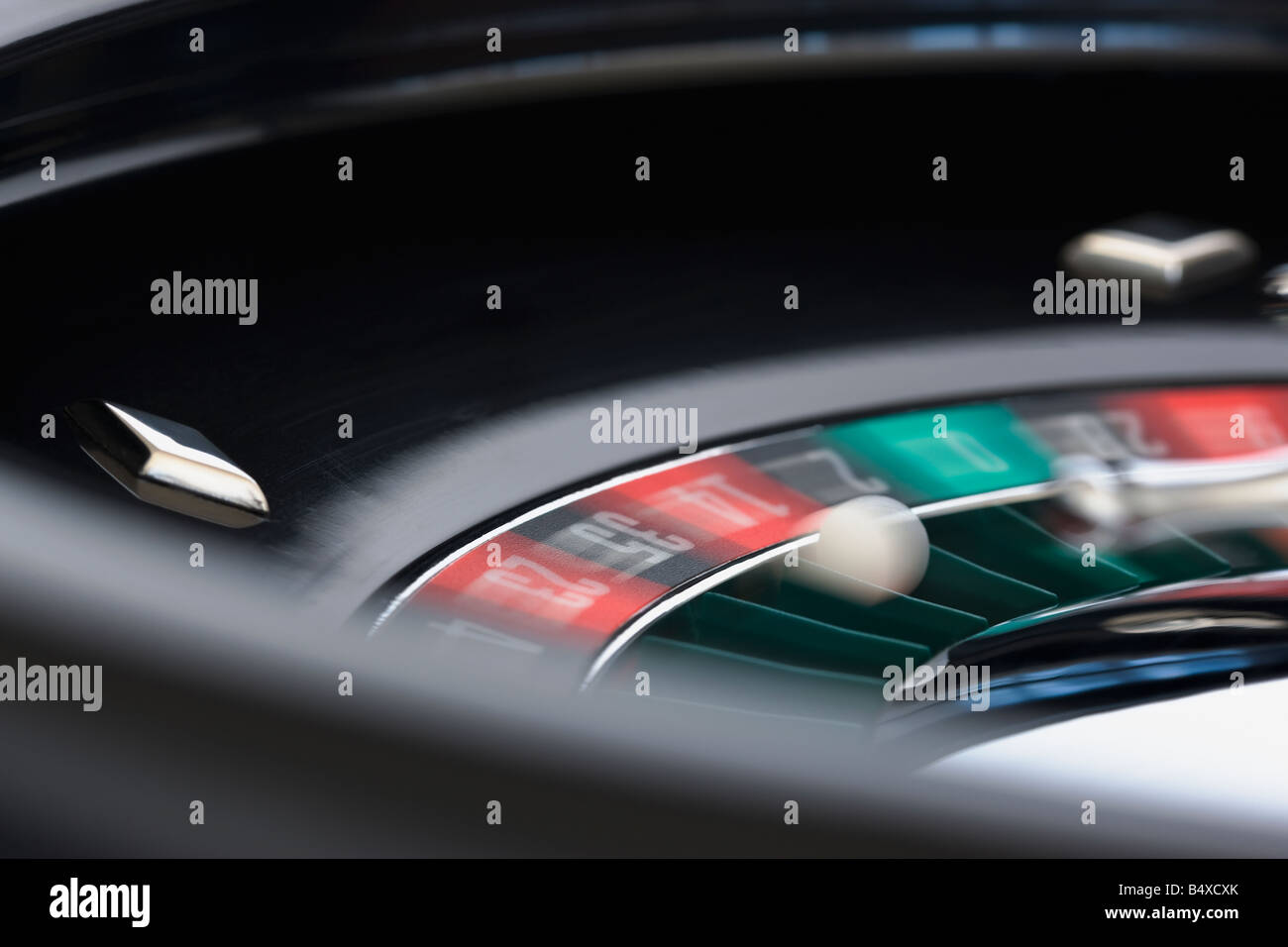 Close up of spinning roulette table Stock Photo - Alamy