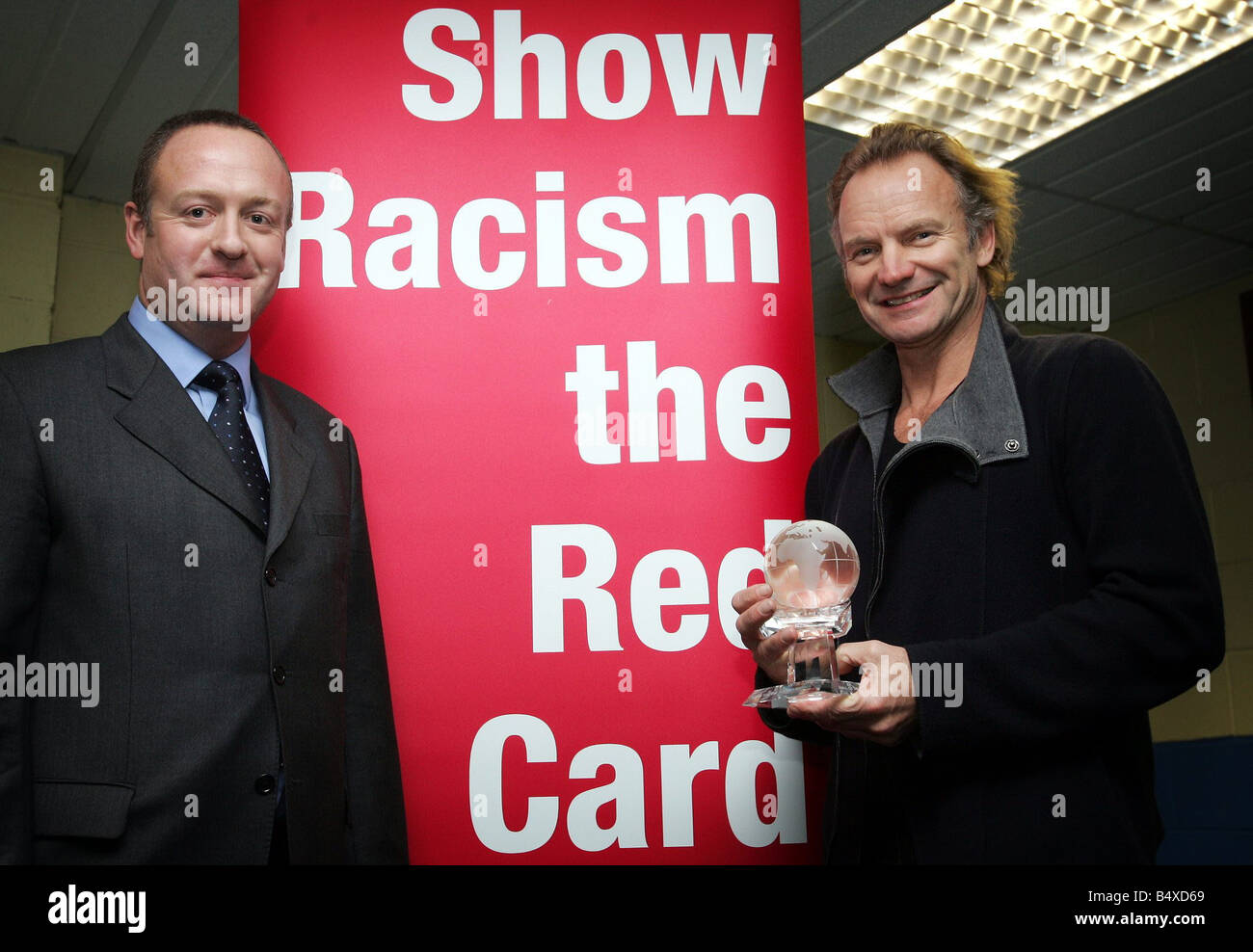 Kevin O Malley from Coutts bank presented Sting with a trophy on behalf ...