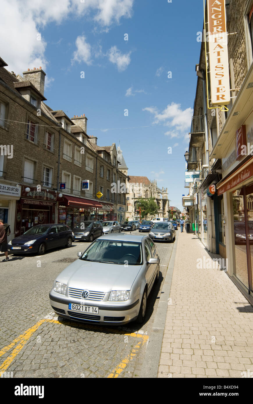 Cars parked in a street in the french town of Falaise Normandy France ...