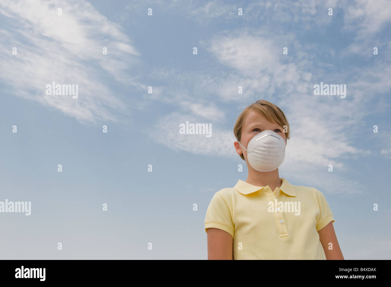 Girl wearing dust mask Stock Photo - Alamy