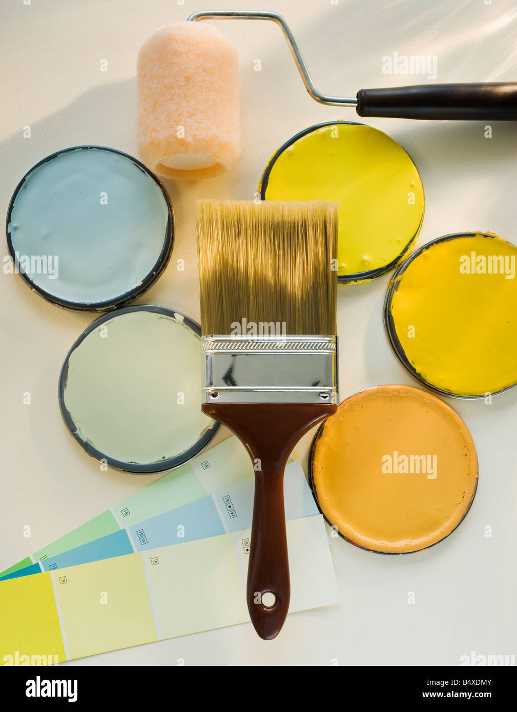 Paintbrushes and assorted paints Stock Photo - Alamy