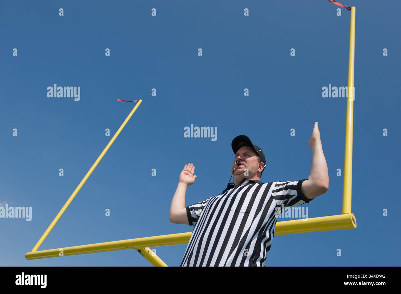 Football referee calling field goal Stock Photo - Alamy
