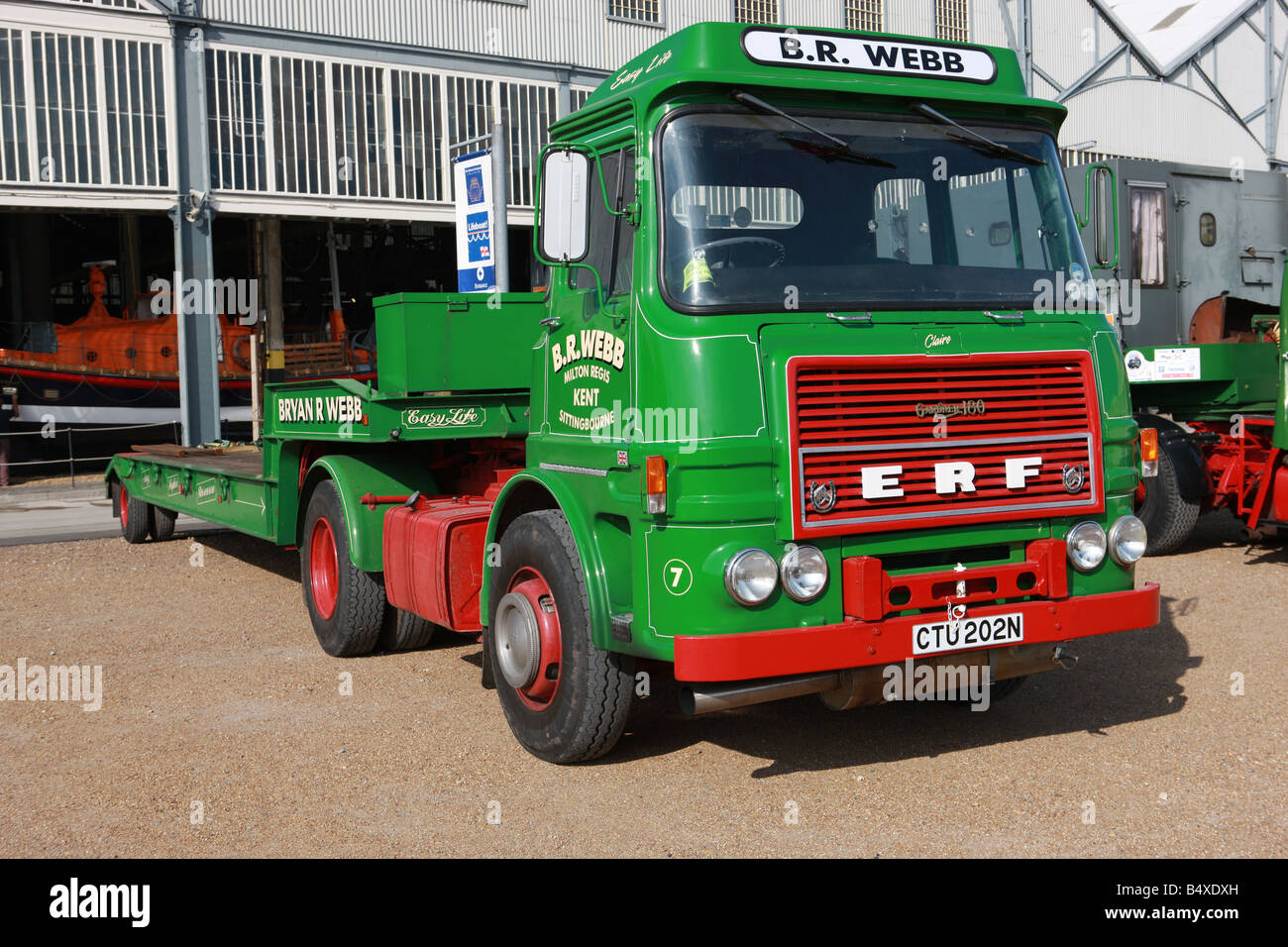 Mid-1970s ERF tractor unit with low-loader trailer photographed in the ...
