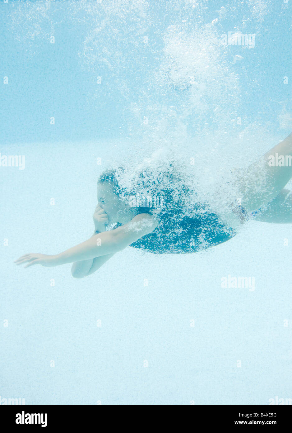 Three people diving hi-res stock photography and images - Alamy