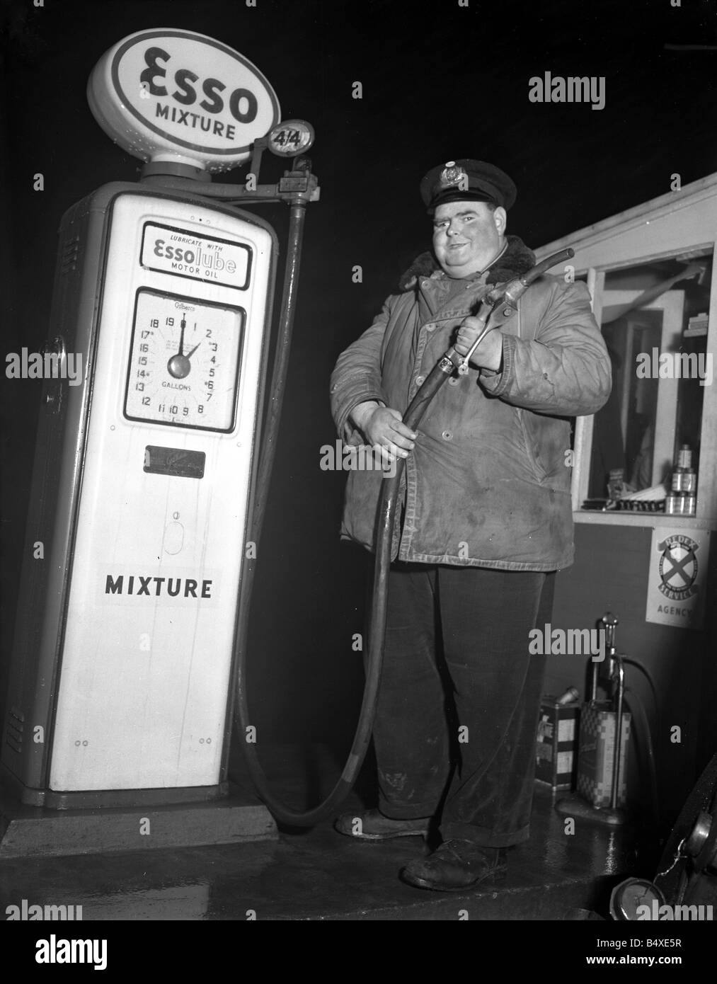 Petrol pump attendant December 1953 D7665 Stock Photo - Alamy