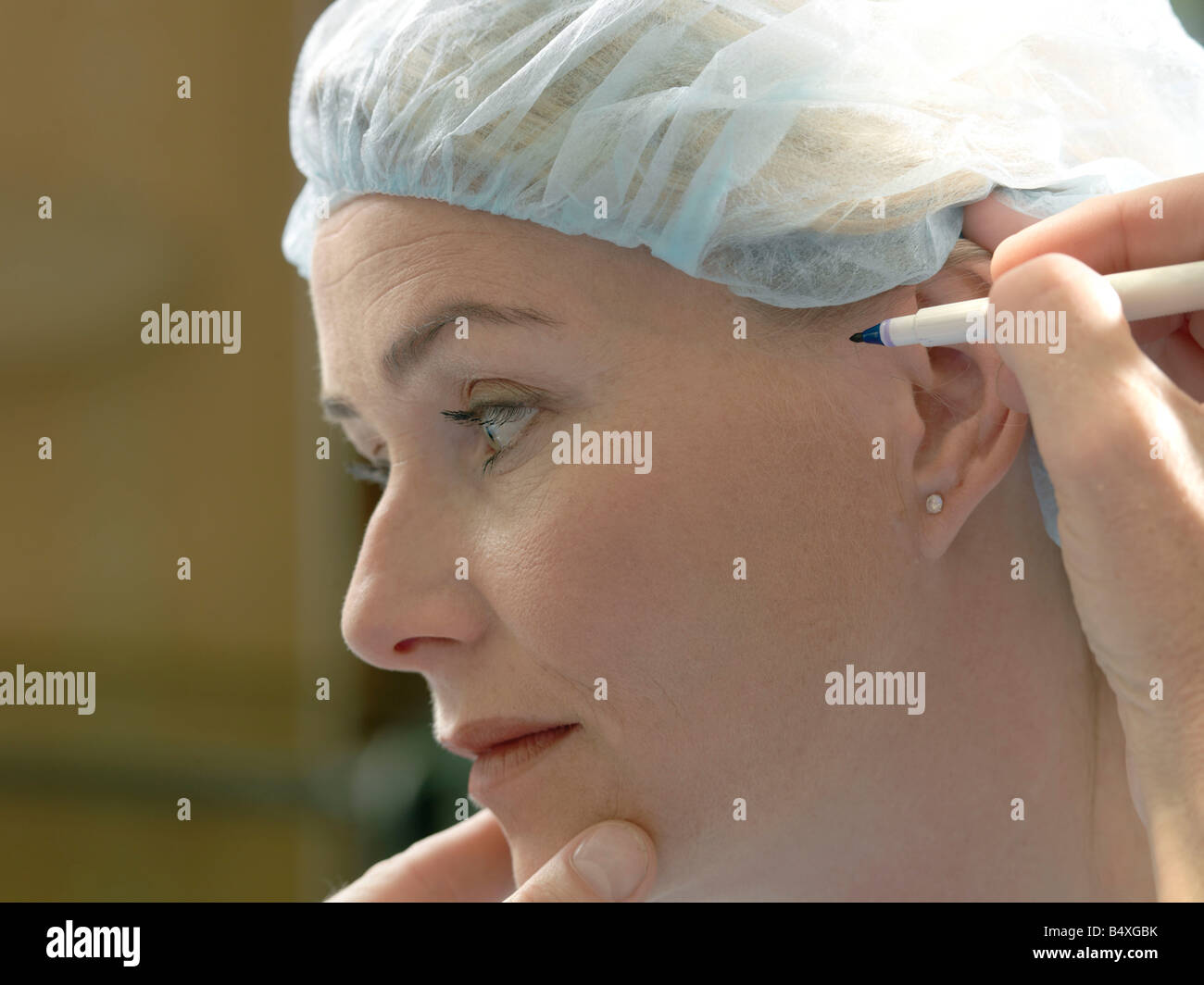 Doctor preparing patient for surgery Stock Photo - Alamy