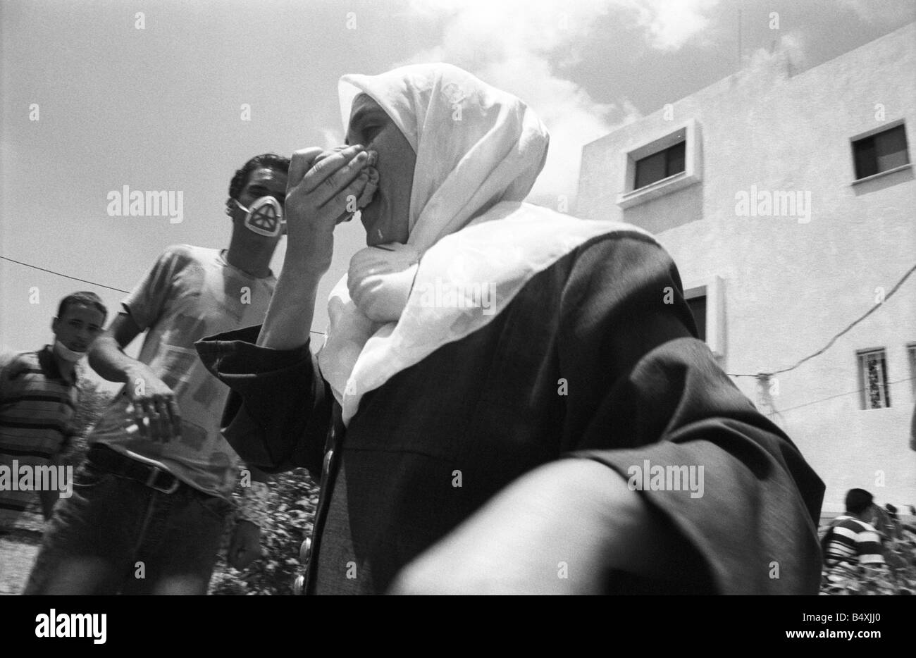 Tear gas israel Black and White Stock Photos & Images - Alamy