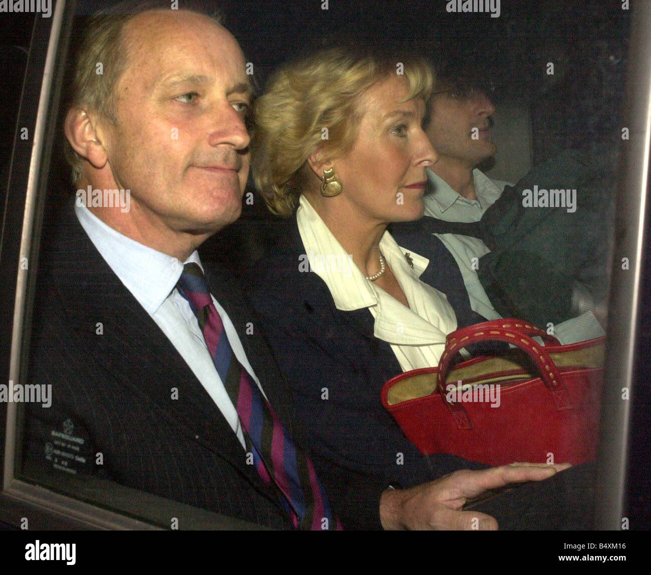 Neil Hamilton and wife Christine and Louis Theroux leaving Barkingside ...