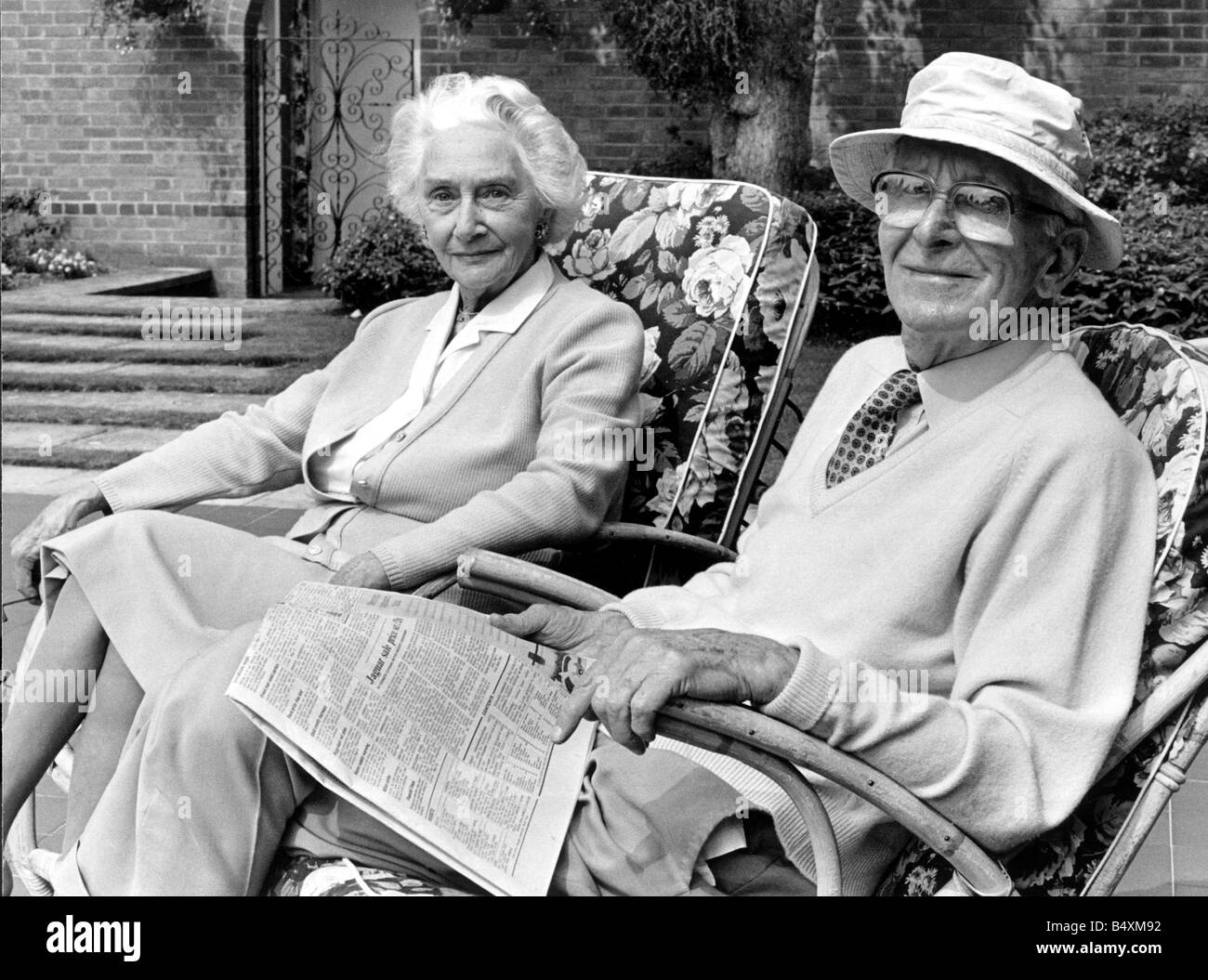 Sir William Lyons and Lady Lyons pictured in their garden at Wappenbury ...