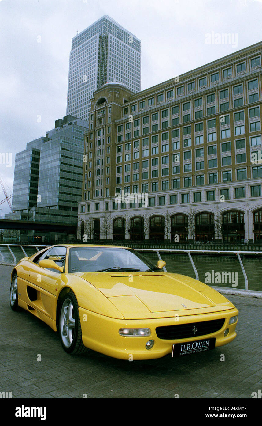A yellow Ferrari F355 sportscar pictured at Canary Wharf London ...