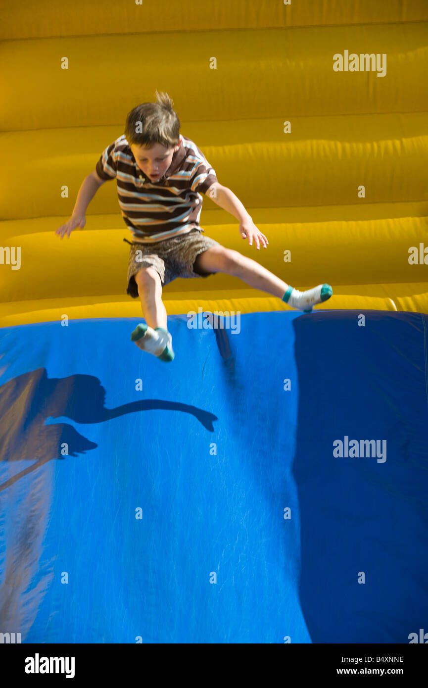 Boy jumping down on the Playground Poplars Adventure Mega Maze ...