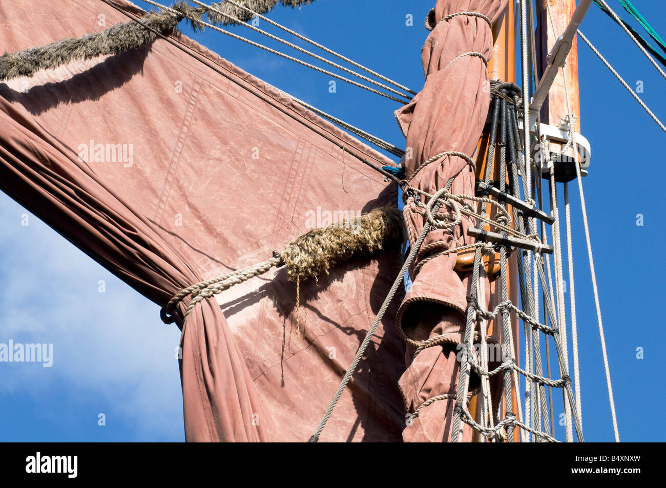 Sail and mast of a yatch at St Katherines Dock in London England UK ...