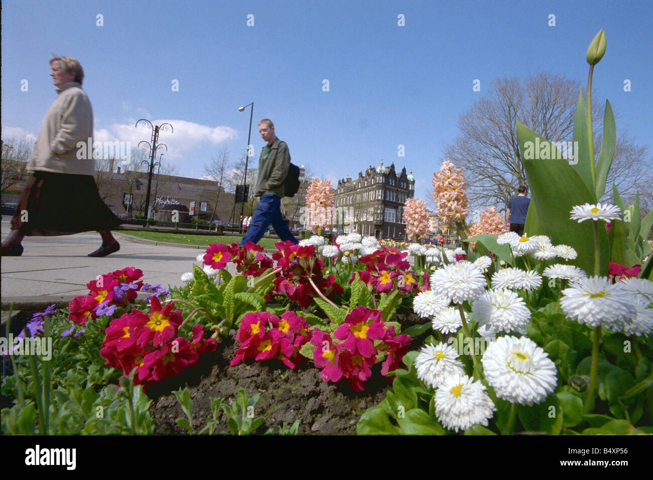 People walking in the summer sun in Newcastle Stock Photo - Alamy