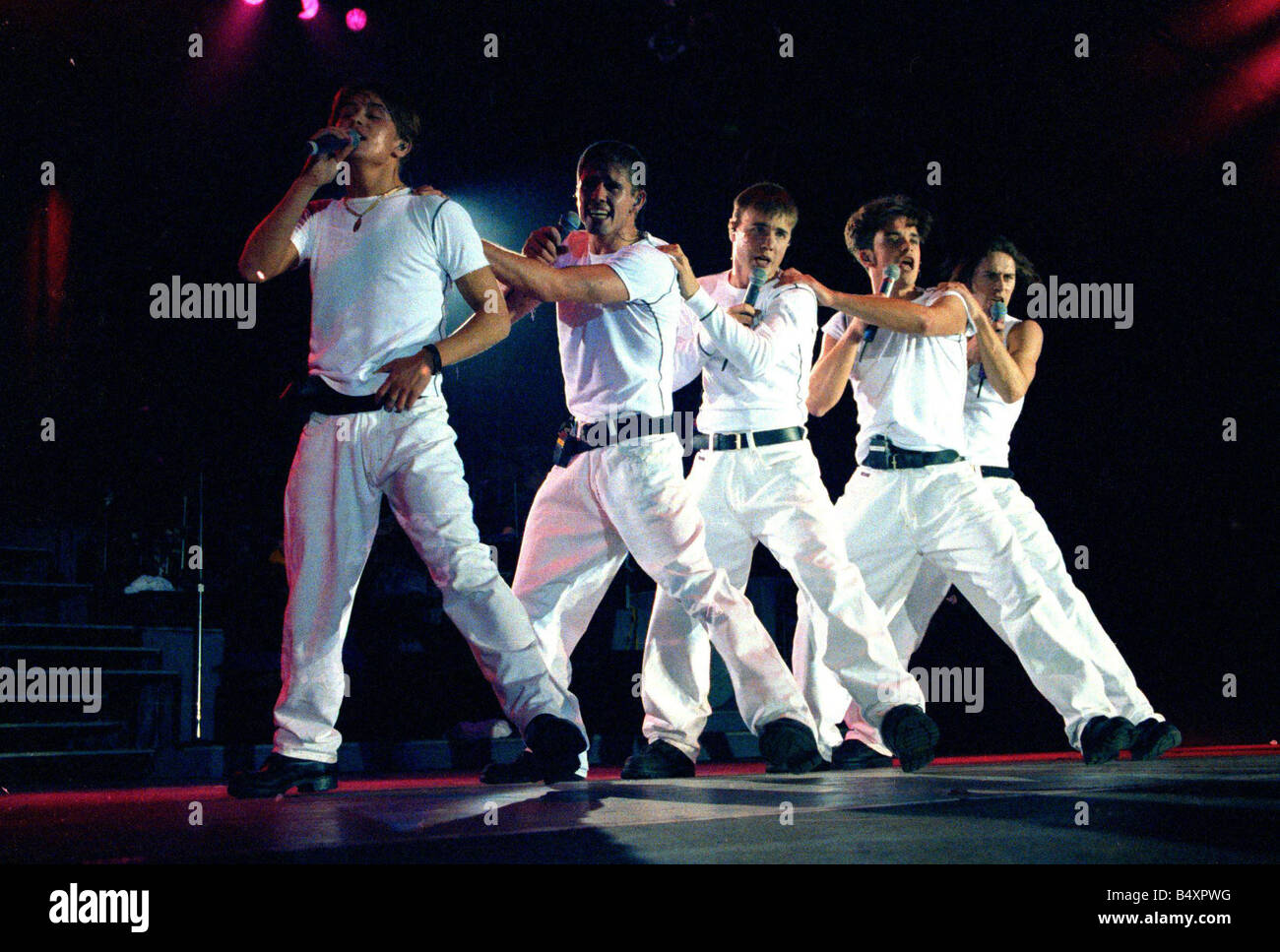 Take That live on stage during a concert August 1993 Stock Photo - Alamy