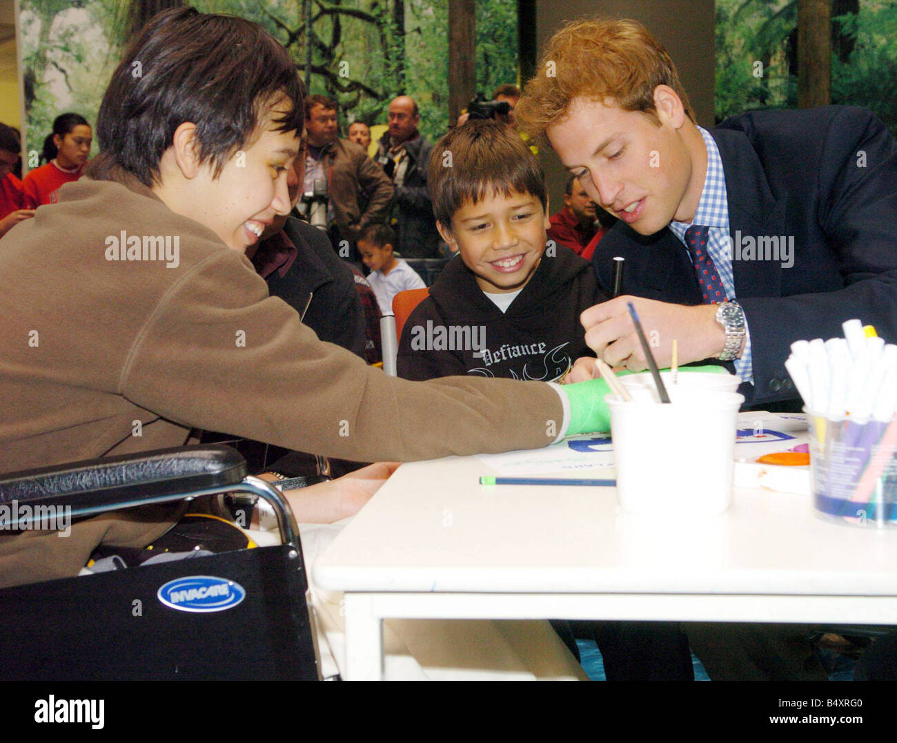 Signing Brendon Kroons plaster cast Prince William visits the Auckland ...