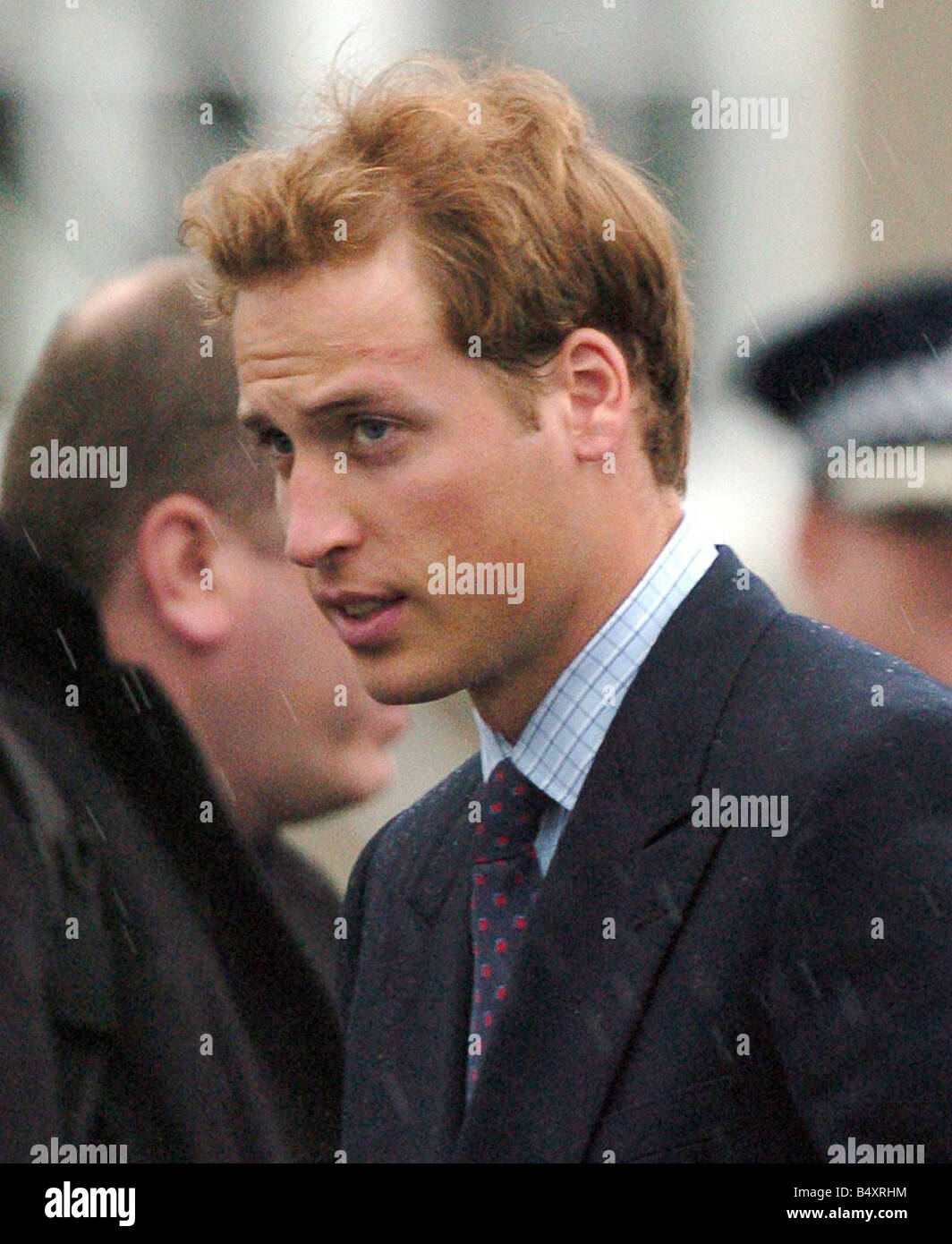 Prince William waits to board his private plane in the rain at Blenheim ...
