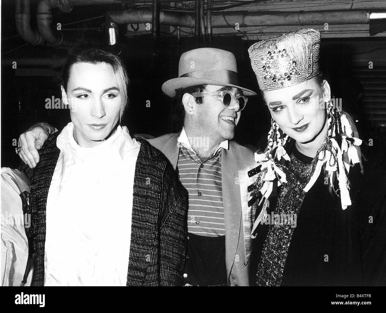 Boy George wearing hat Ribbons in his hair dbase msi Stock Photo - Alamy