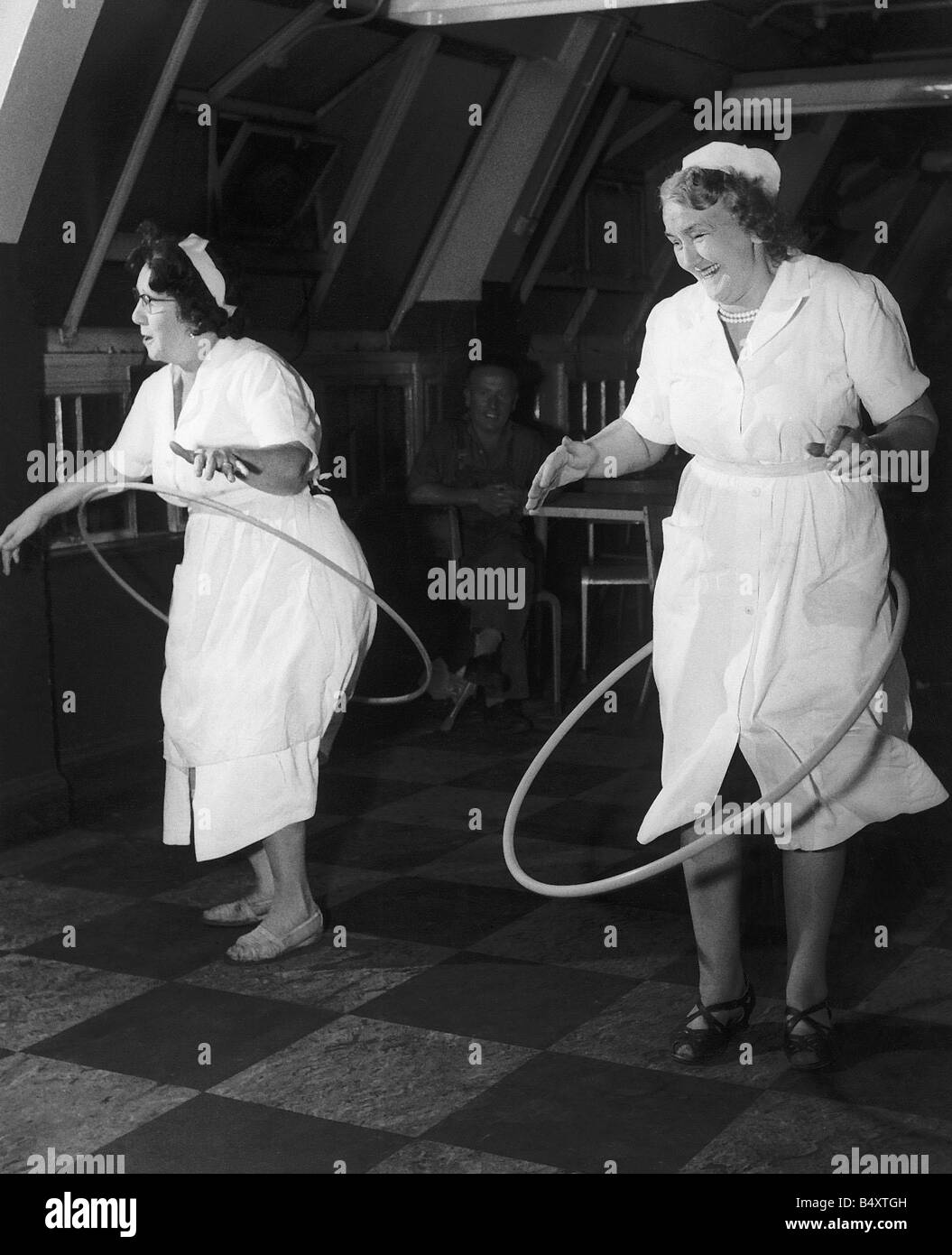 Hula hoop 1950s hi-res stock photography and images - Alamy