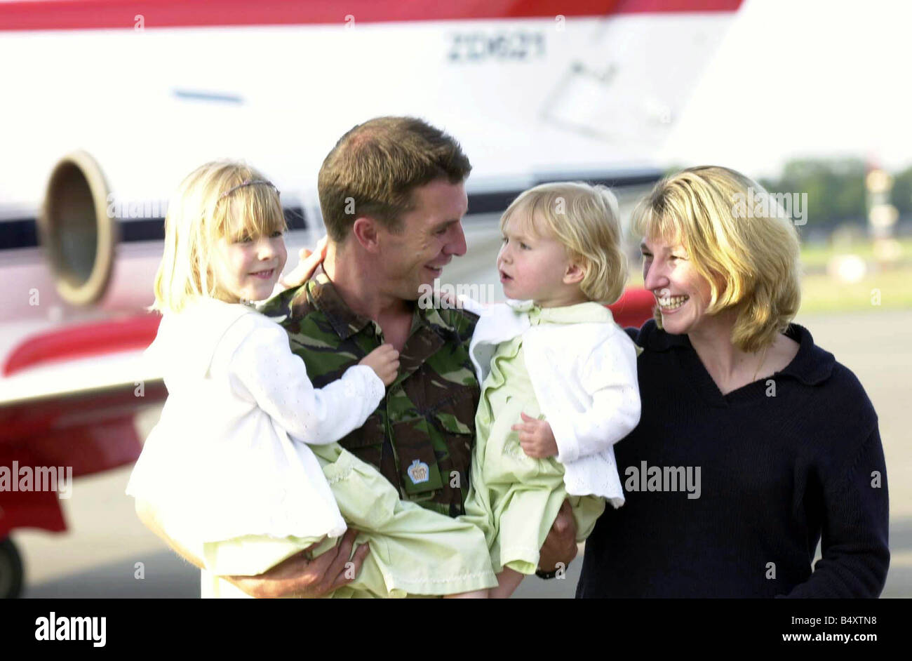 Major Harrison is met by his daughter Philippa 5 and rt his wife ...