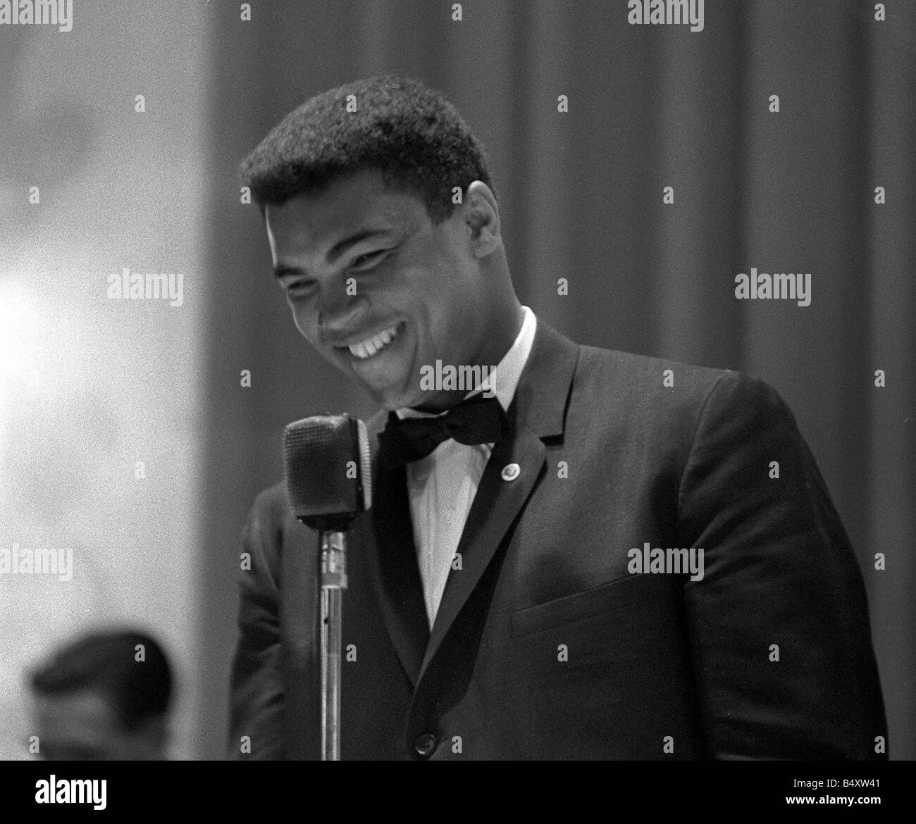 Cassius Clay laughing into microphone May 1966 Arrived in London for a ...