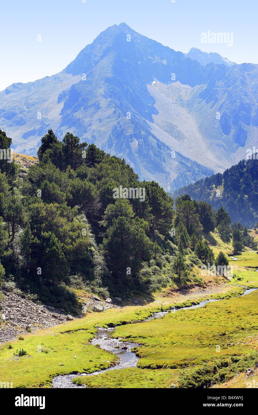 Stream passing near mountain Stock Photo - Alamy