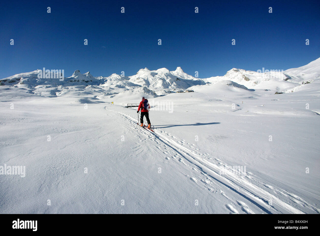 Man ice-skating, rear view Stock Photo - Alamy