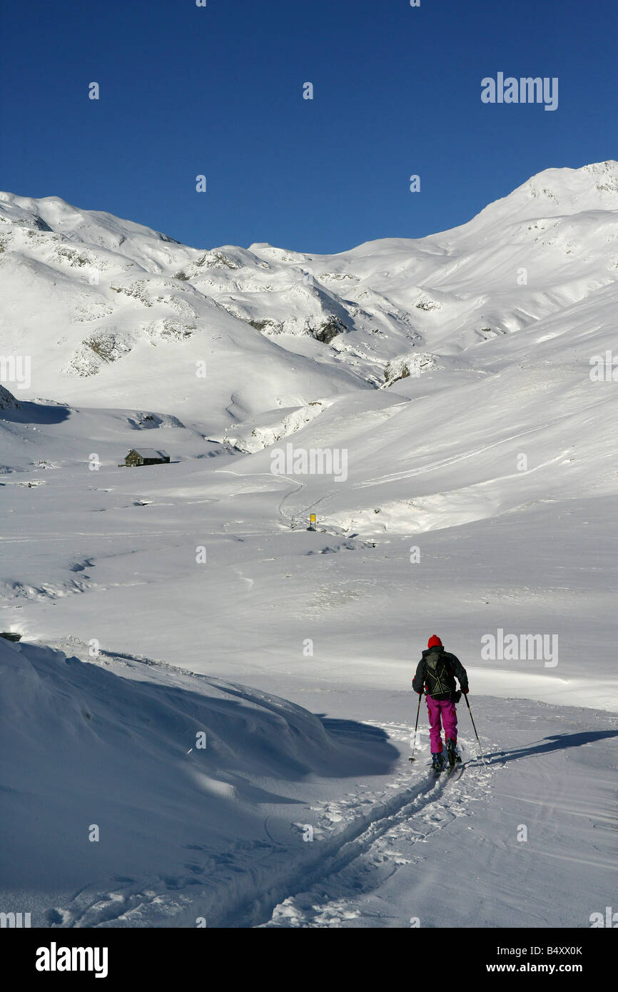 Man ice-skating, rear view Stock Photo - Alamy