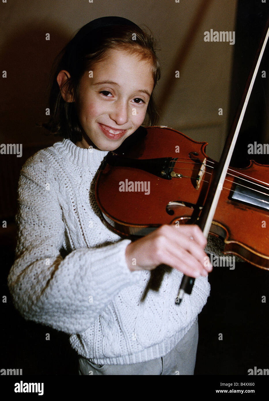 Walton Sextuplets Sarah Walton on the violin dbase Stock Photo - Alamy