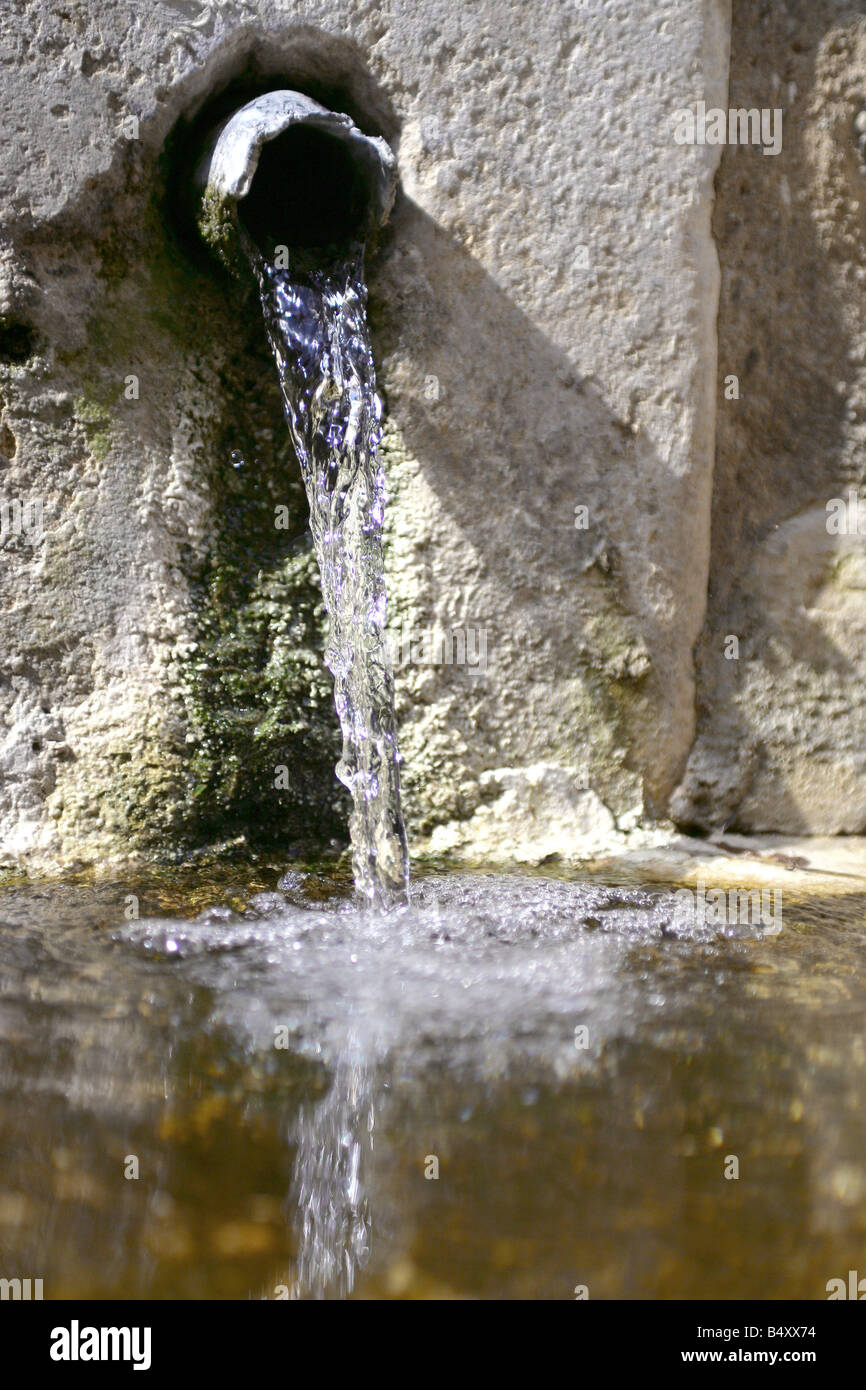Water flowing through drainage pipe Stock Photo - Alamy