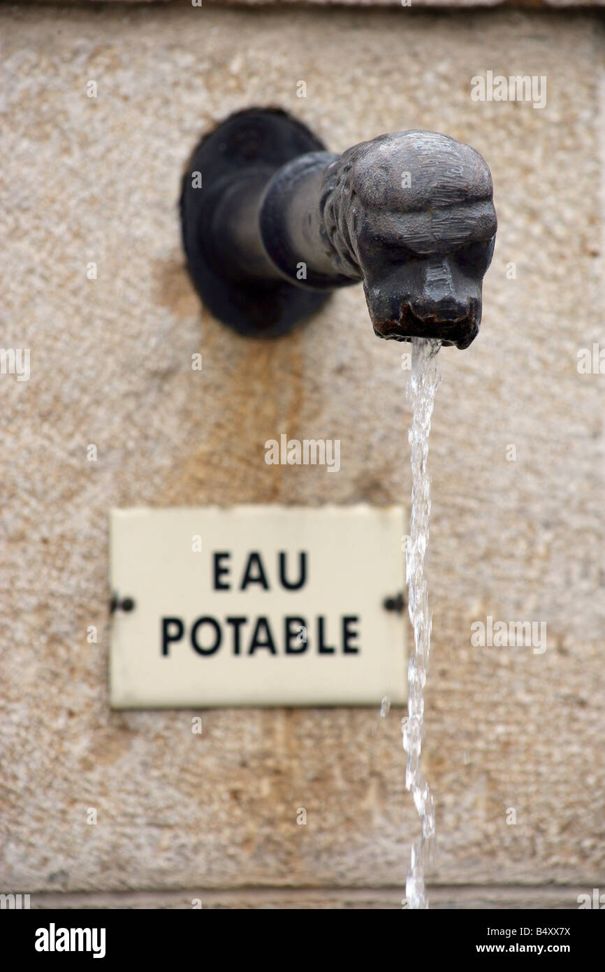 Water flowing through tap, close-up Stock Photo - Alamy
