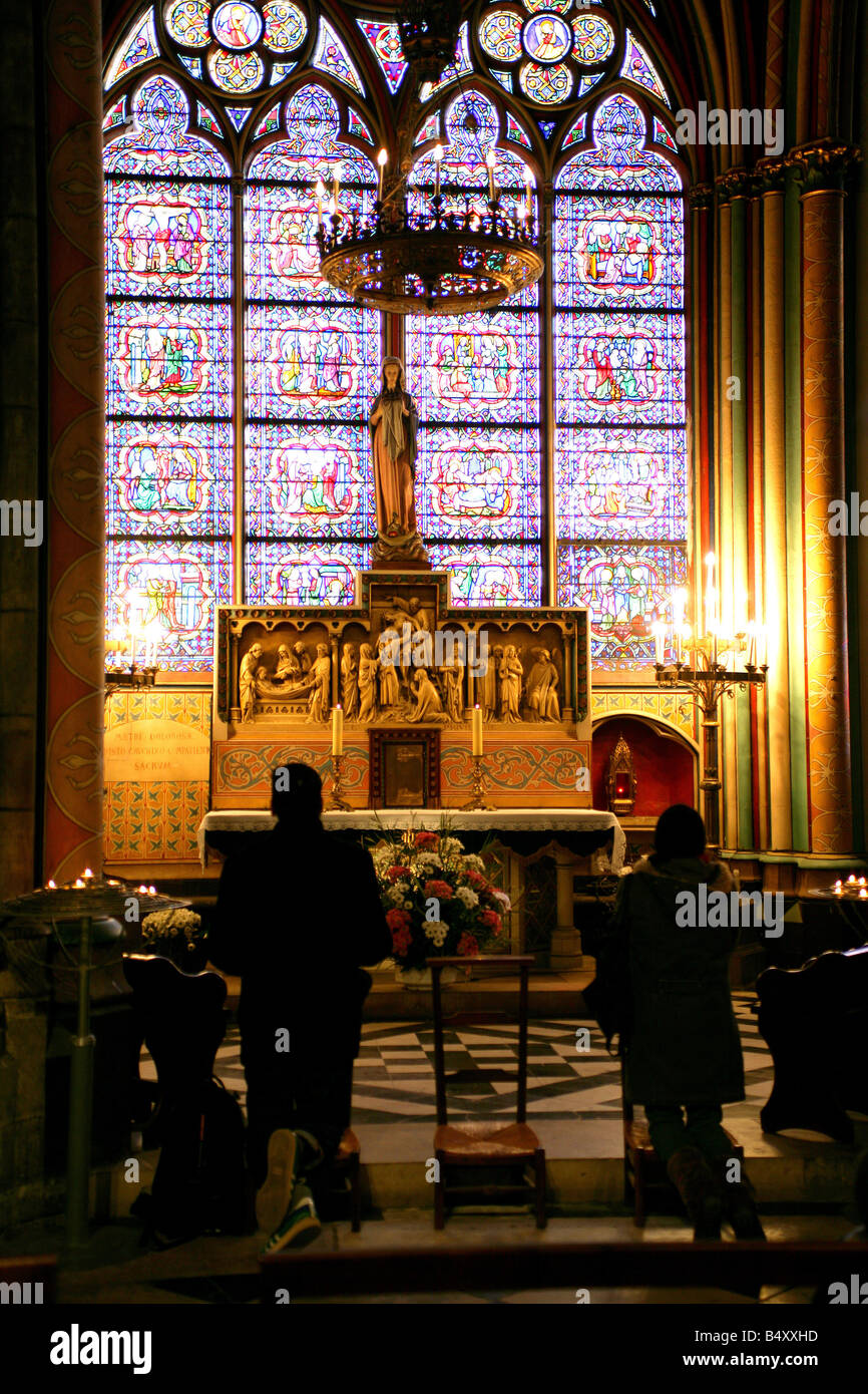People praying in church, rear view Stock Photo - Alamy