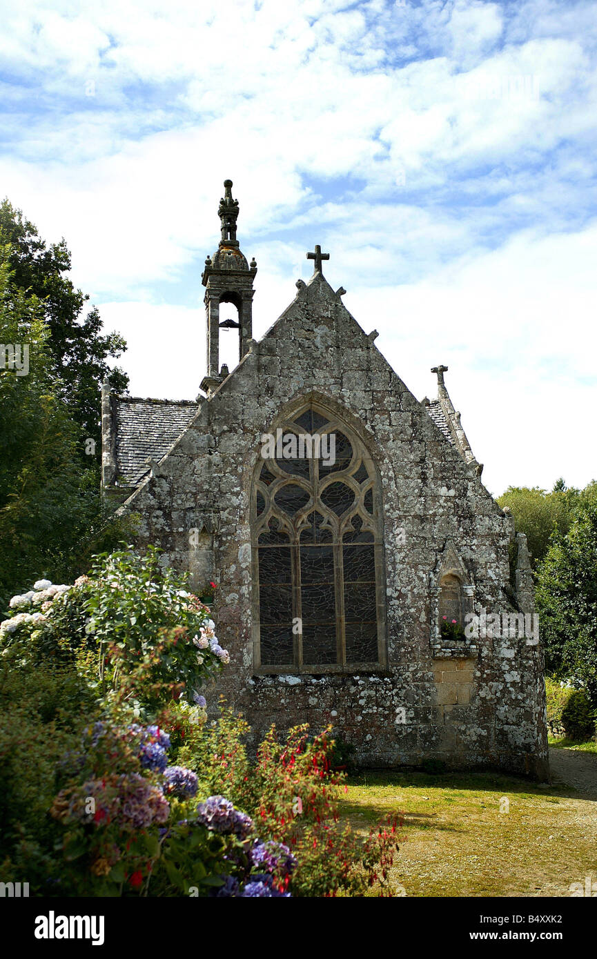 Garden with church in the background Stock Photo - Alamy