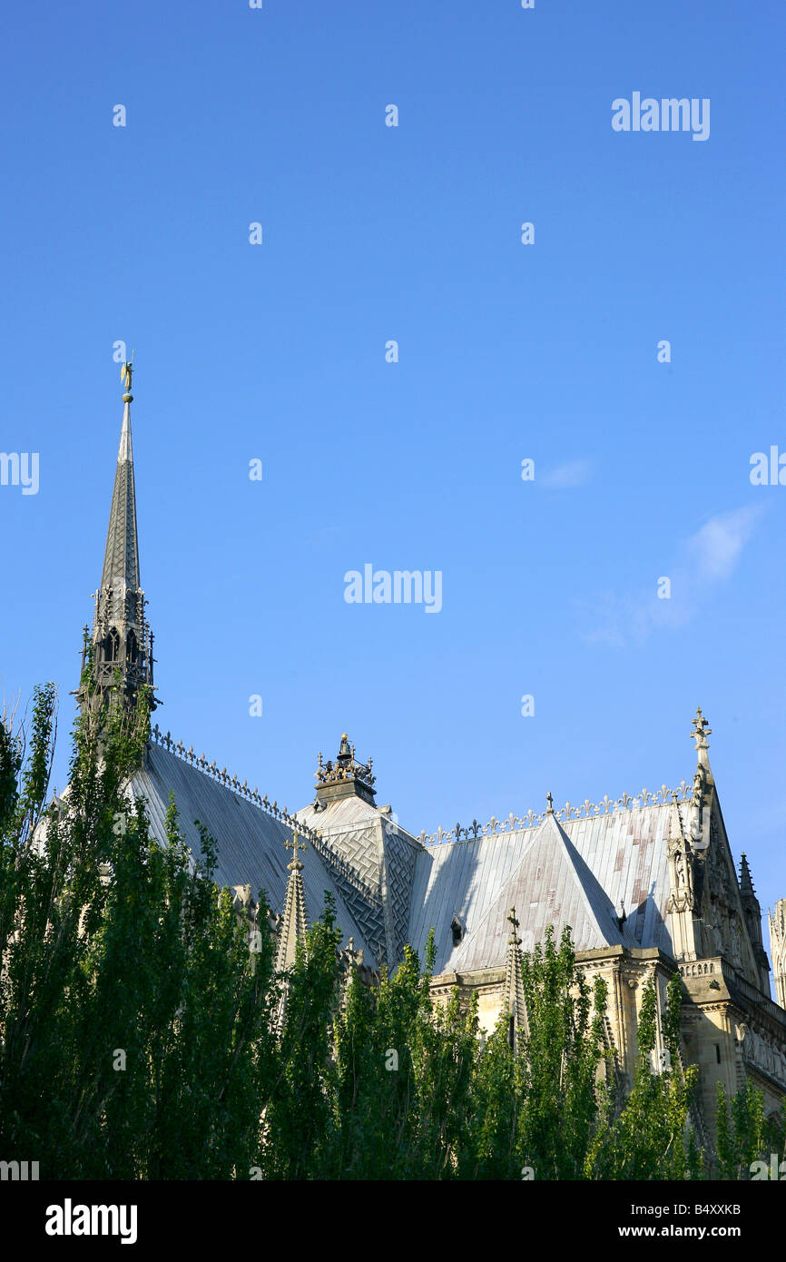 Trees with church in background Stock Photo - Alamy