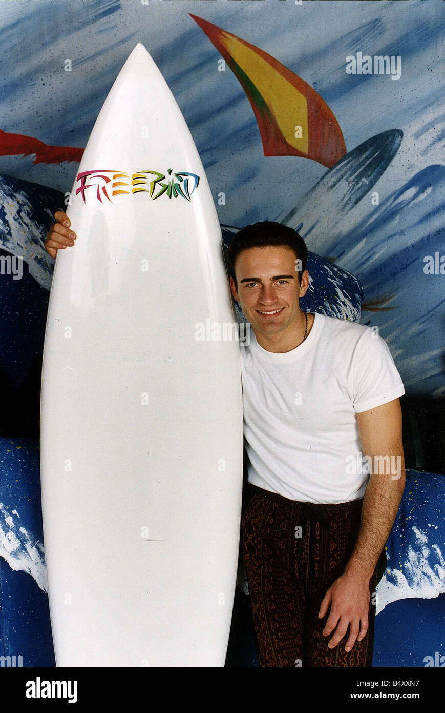 Julian McMahon Australian actor with surfboard Stock Photo - Alamy