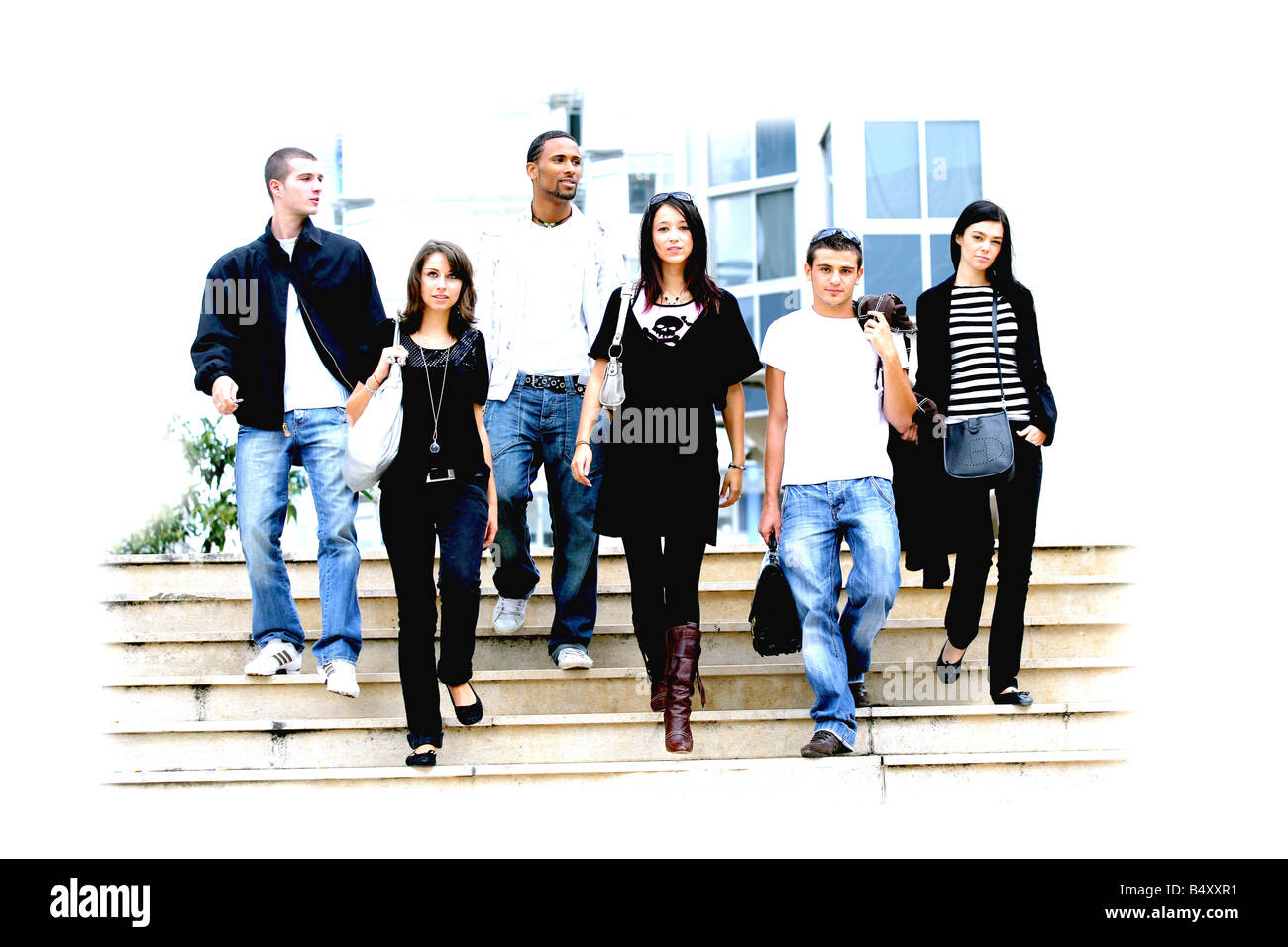 Group of friends walking down steps, portrait Stock Photo - Alamy