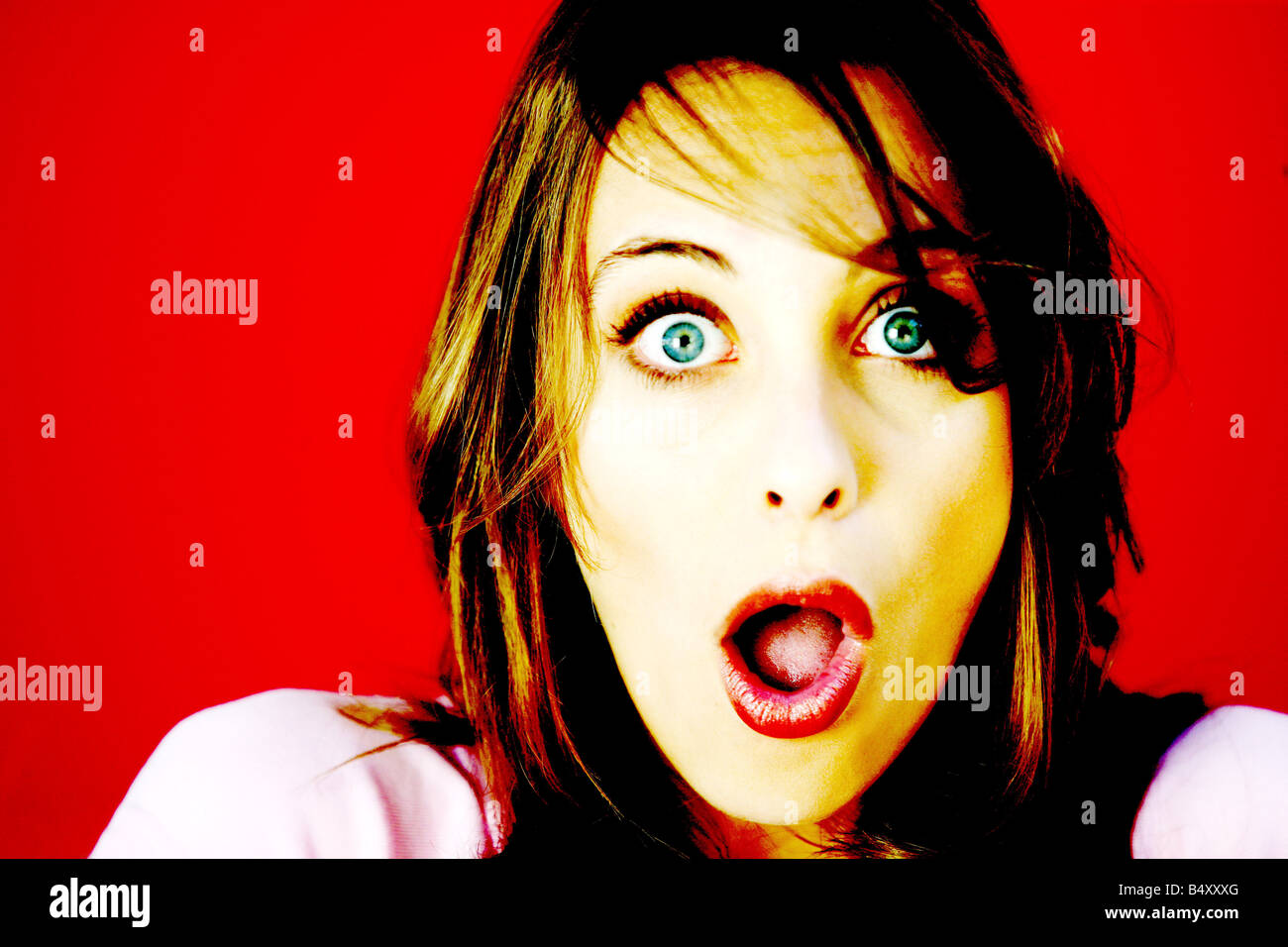 Young woman surprised, portrait, close-up Stock Photo - Alamy