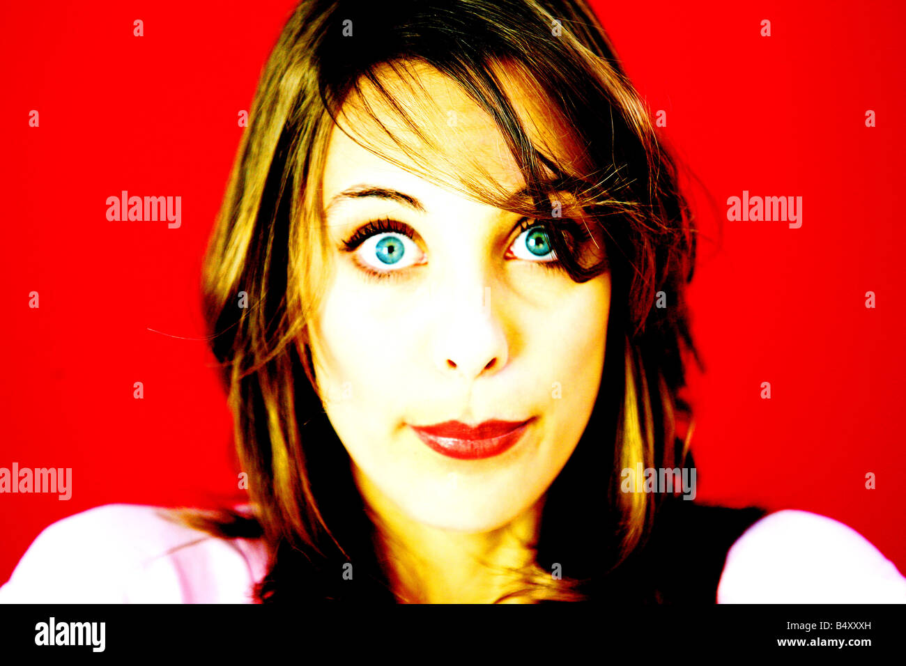 Young woman surprised, portrait, close-up Stock Photo - Alamy