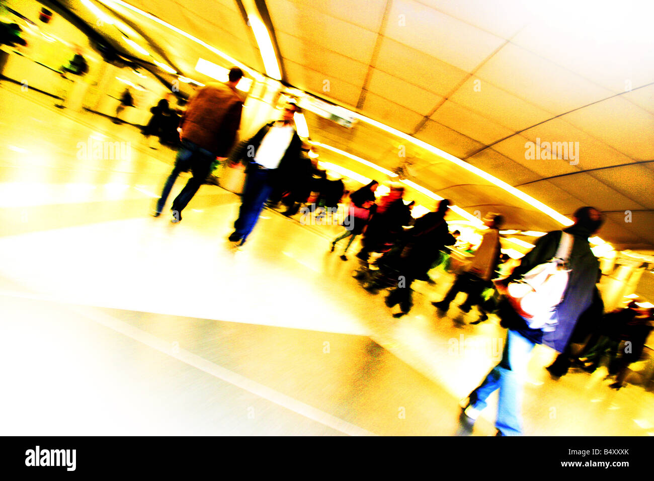Commuters walking in subway Stock Photo - Alamy