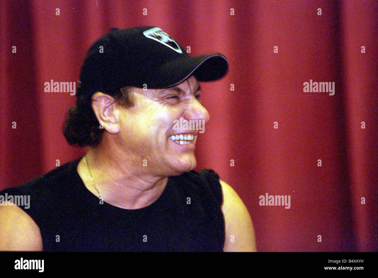 Brian Johnson lead singer of the rock group AC DC rehearsing with his ...