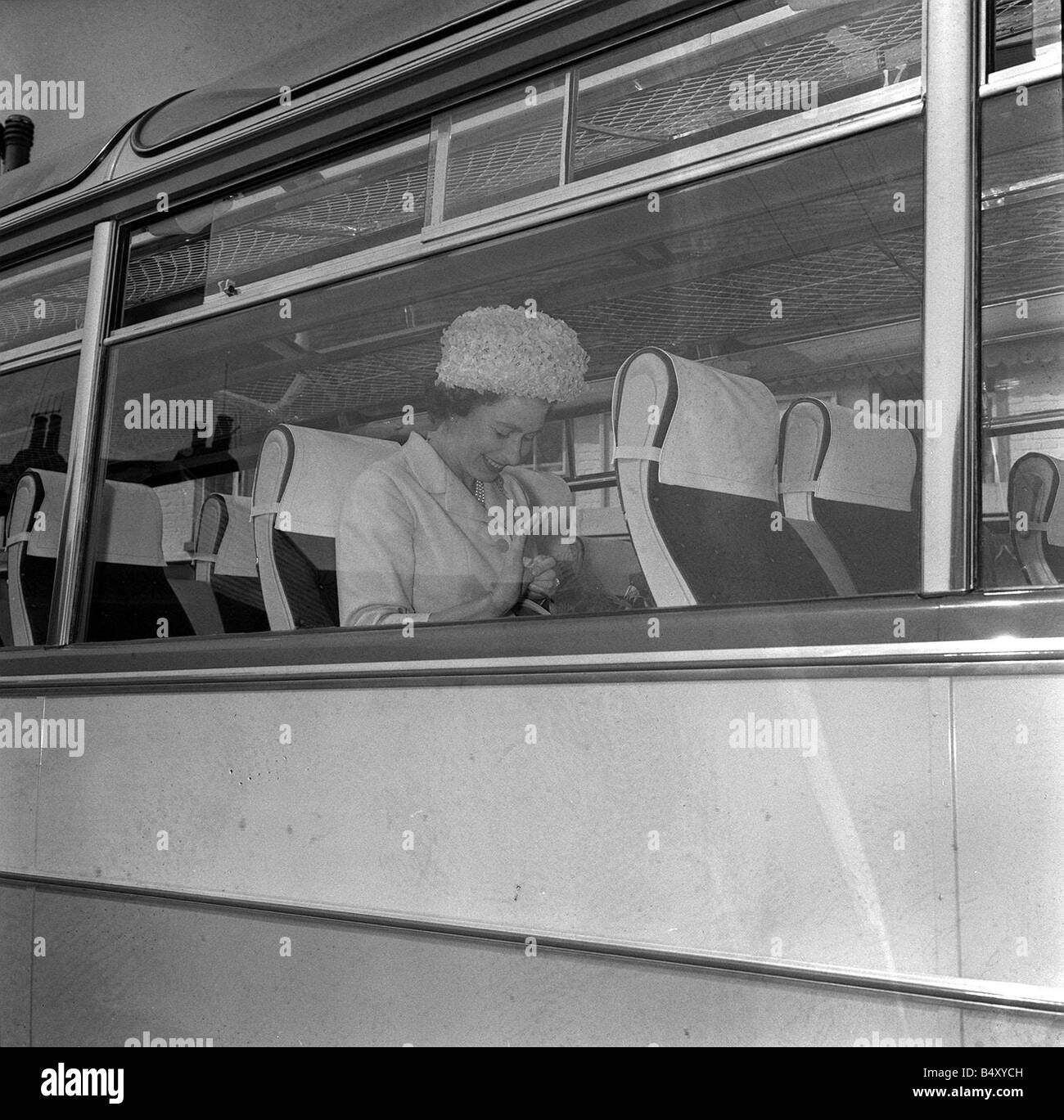 Sitting on a coach hi-res stock photography and images - Alamy