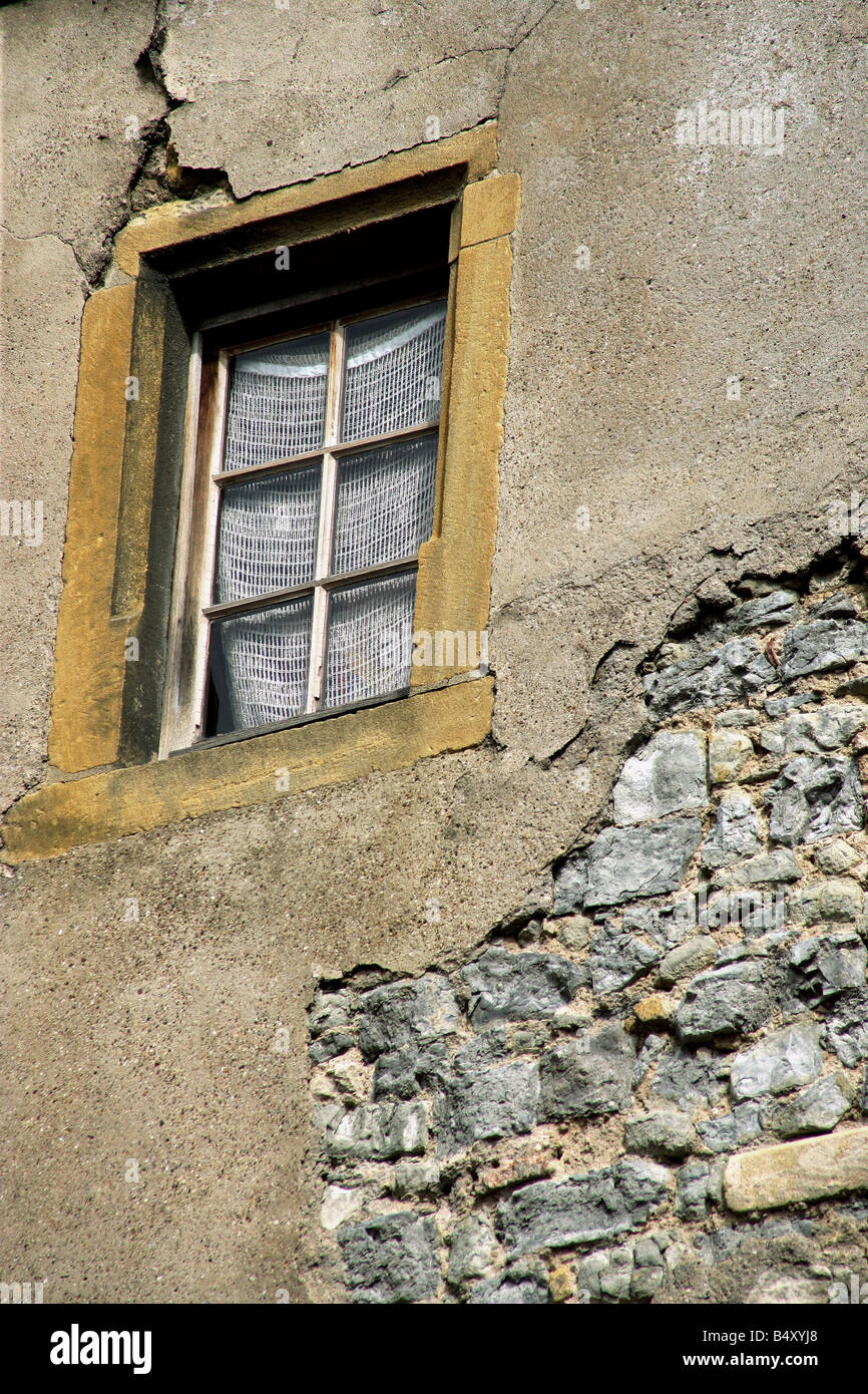 Window on damaged stone wall, close-up Stock Photo - Alamy