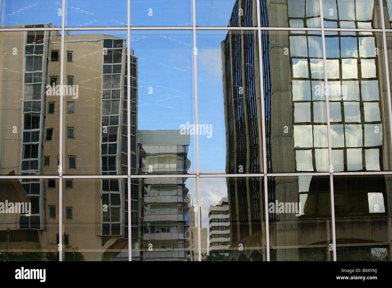 Reflection in windows of building Stock Photo - Alamy